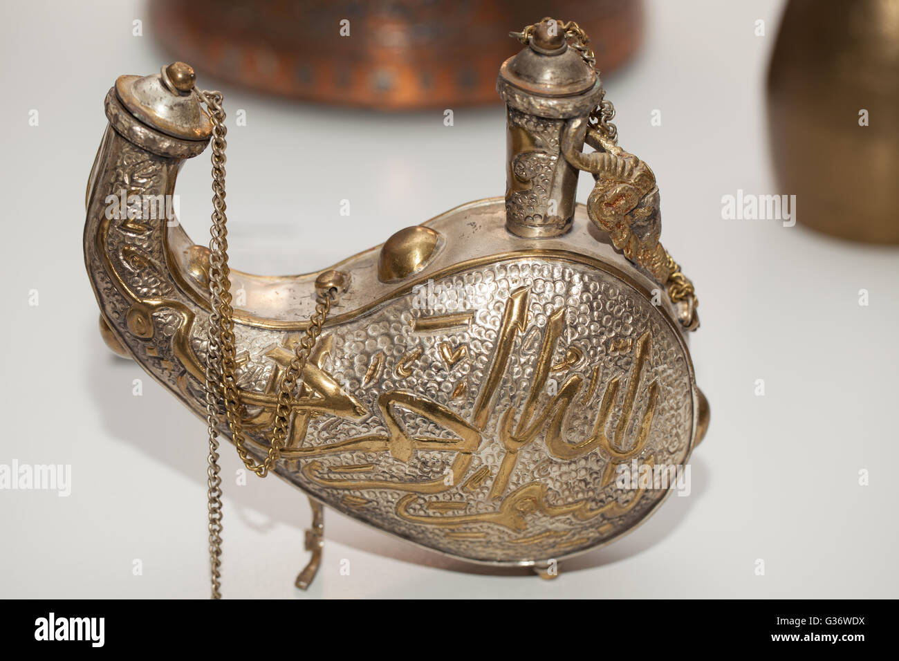 Brass Water Container with Calligraphy. The container inscription in ...