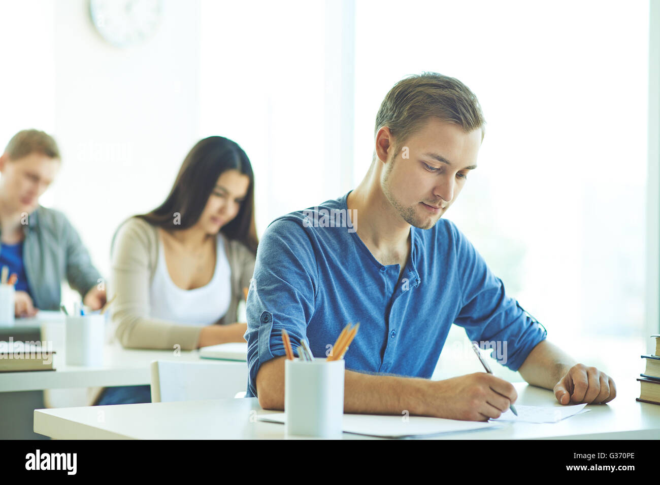People writing and learning hi-res stock photography and images - Alamy