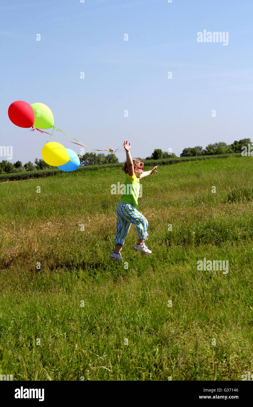 little girl running Stock Photo - Alamy