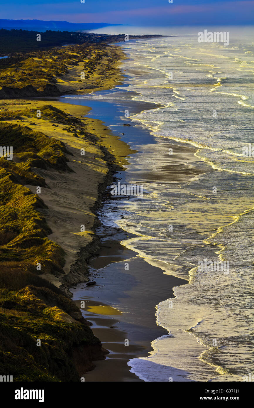 Surf rolling onto expansive sand beach on the Oregon Coast Stock Photo ...