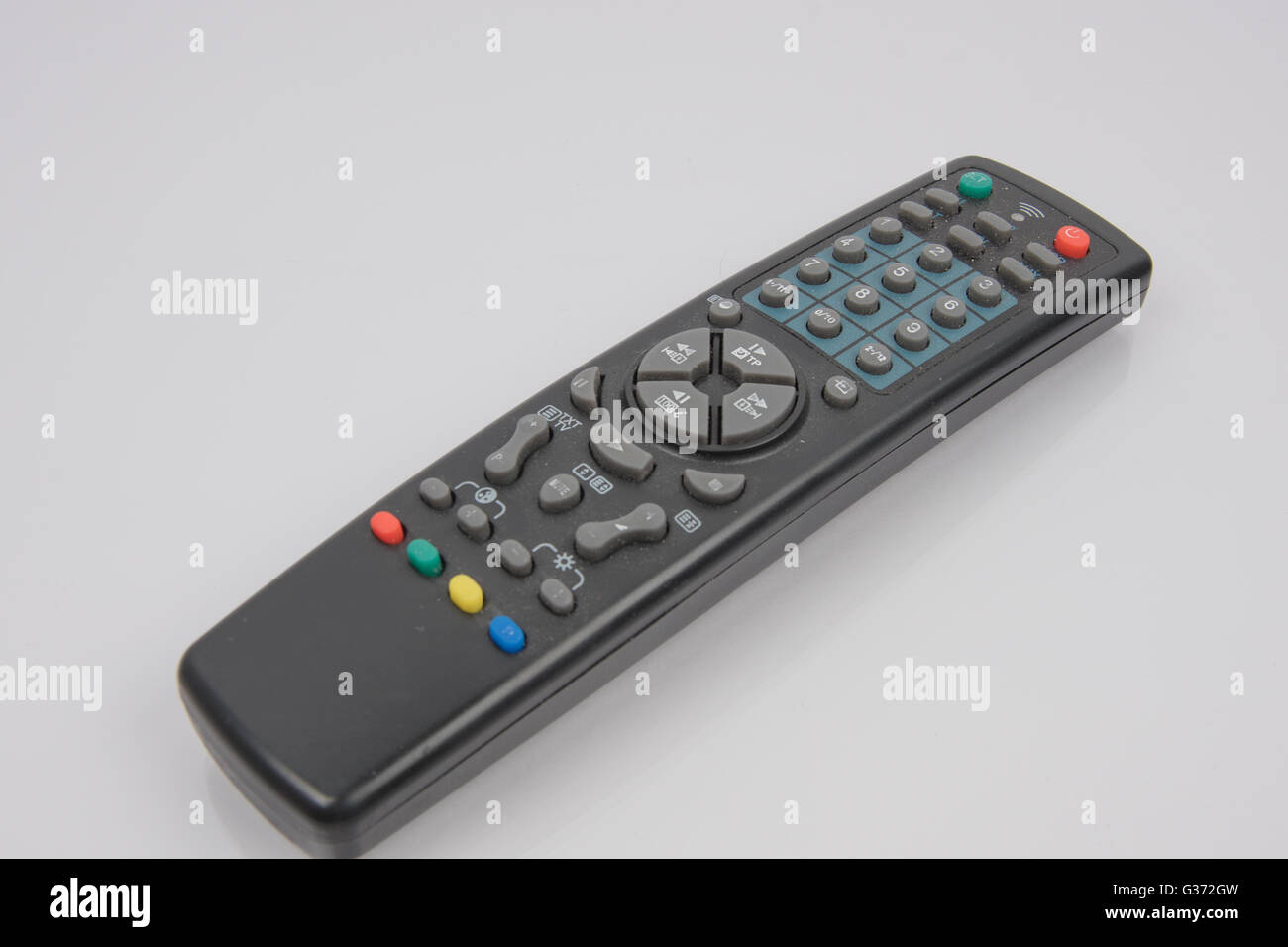 Black single remote control over the white background Stock Photo - Alamy