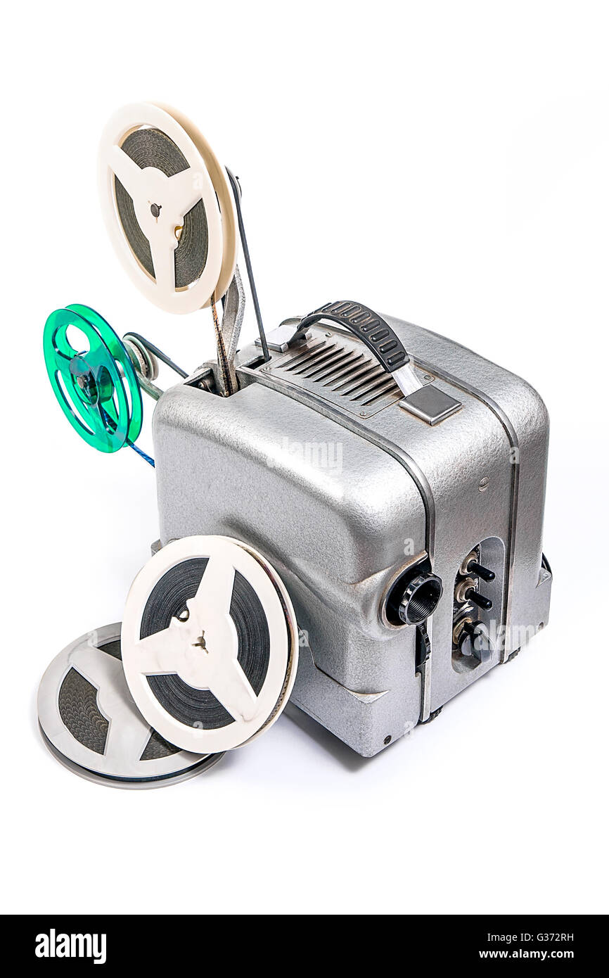 Retro old reel movie projector for cinema. A reels of motion picture ...