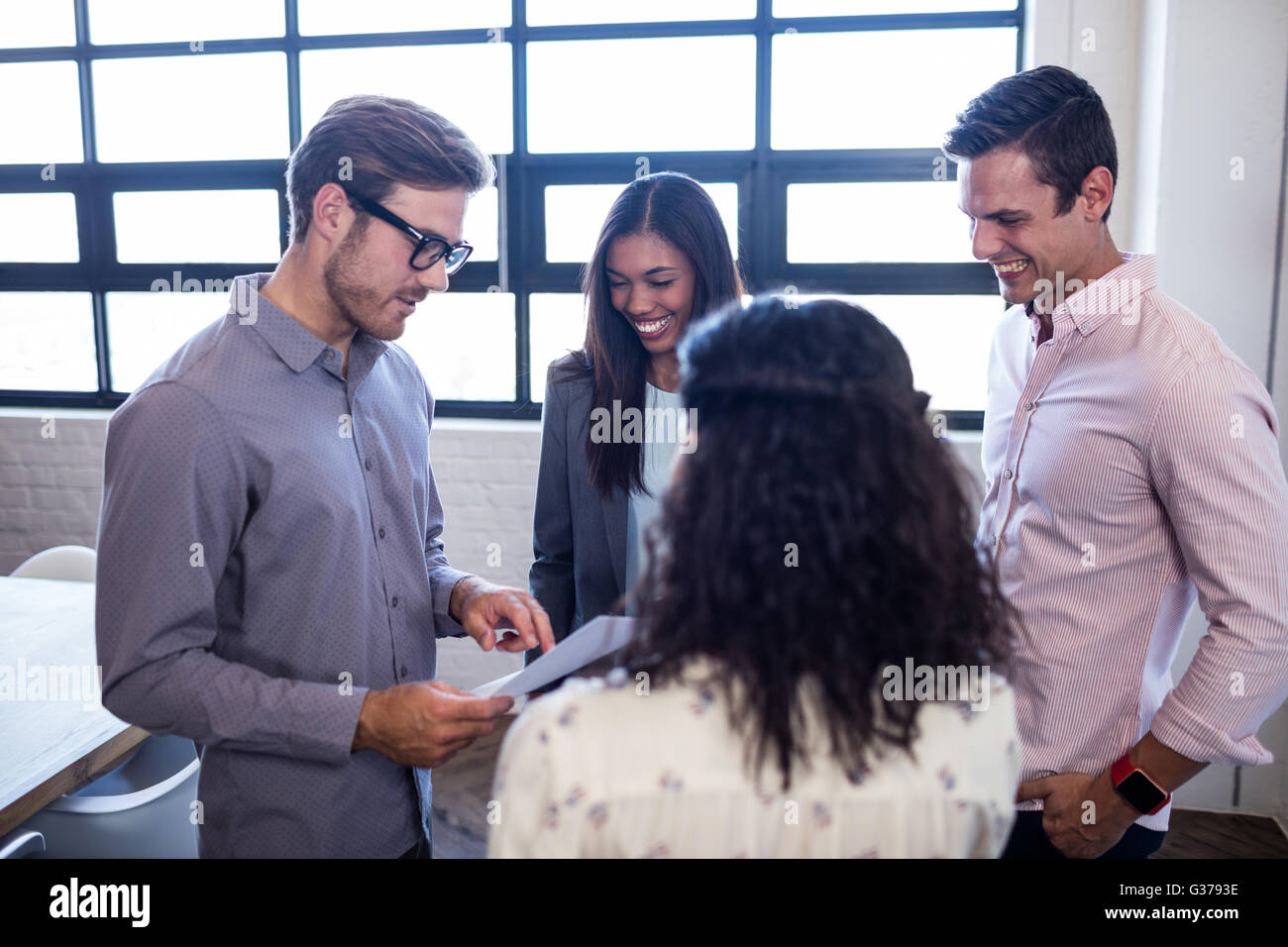 Discussion by reading a document hi-res stock photography and images ...