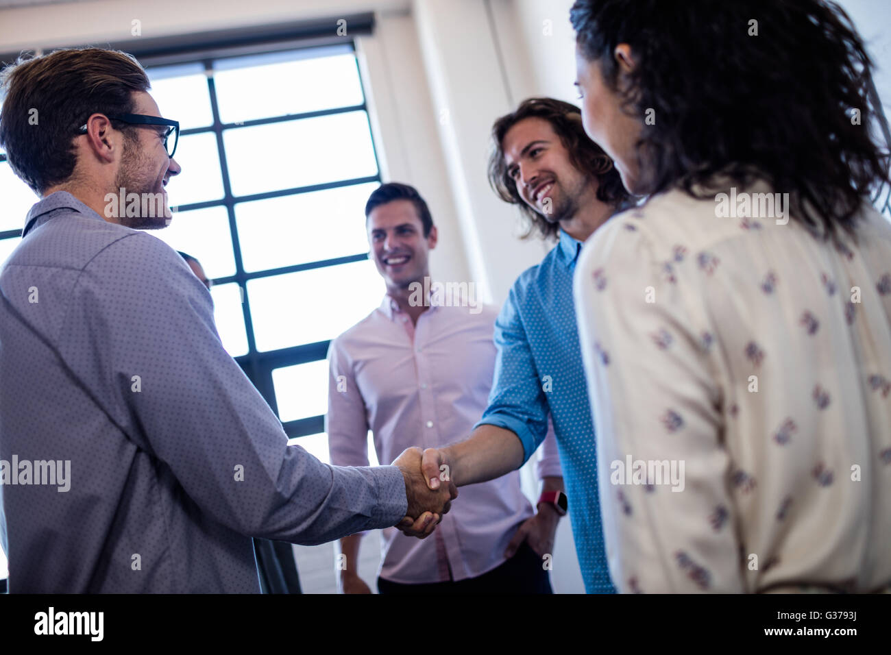 Handshaking hand hi-res stock photography and images - Alamy