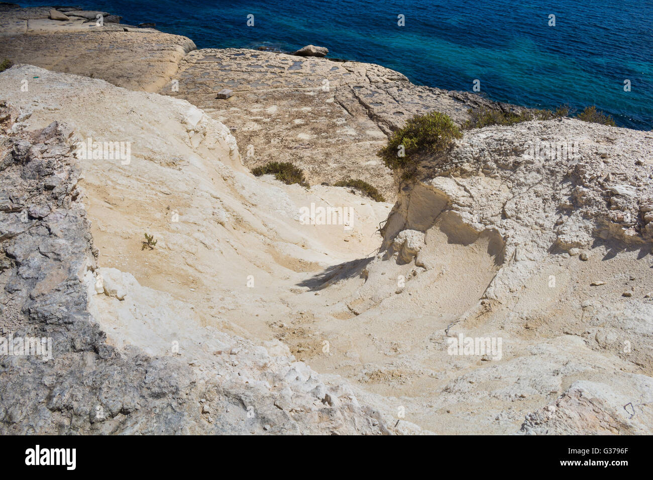 Sand color of the rocks. Coast of mediterranean island Malta, city ...