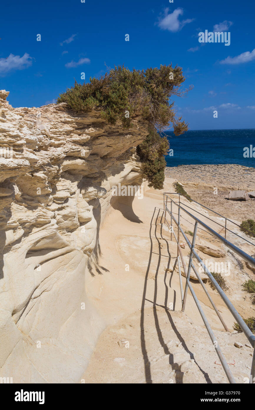 Sand color of the rocks. Coast of mediterranean island Malta, city ...