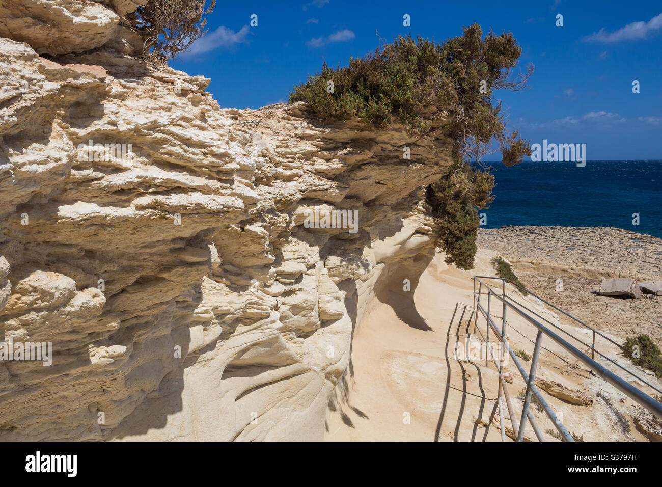 Sand color of the rocks. Coast of mediterranean island Malta, city ...