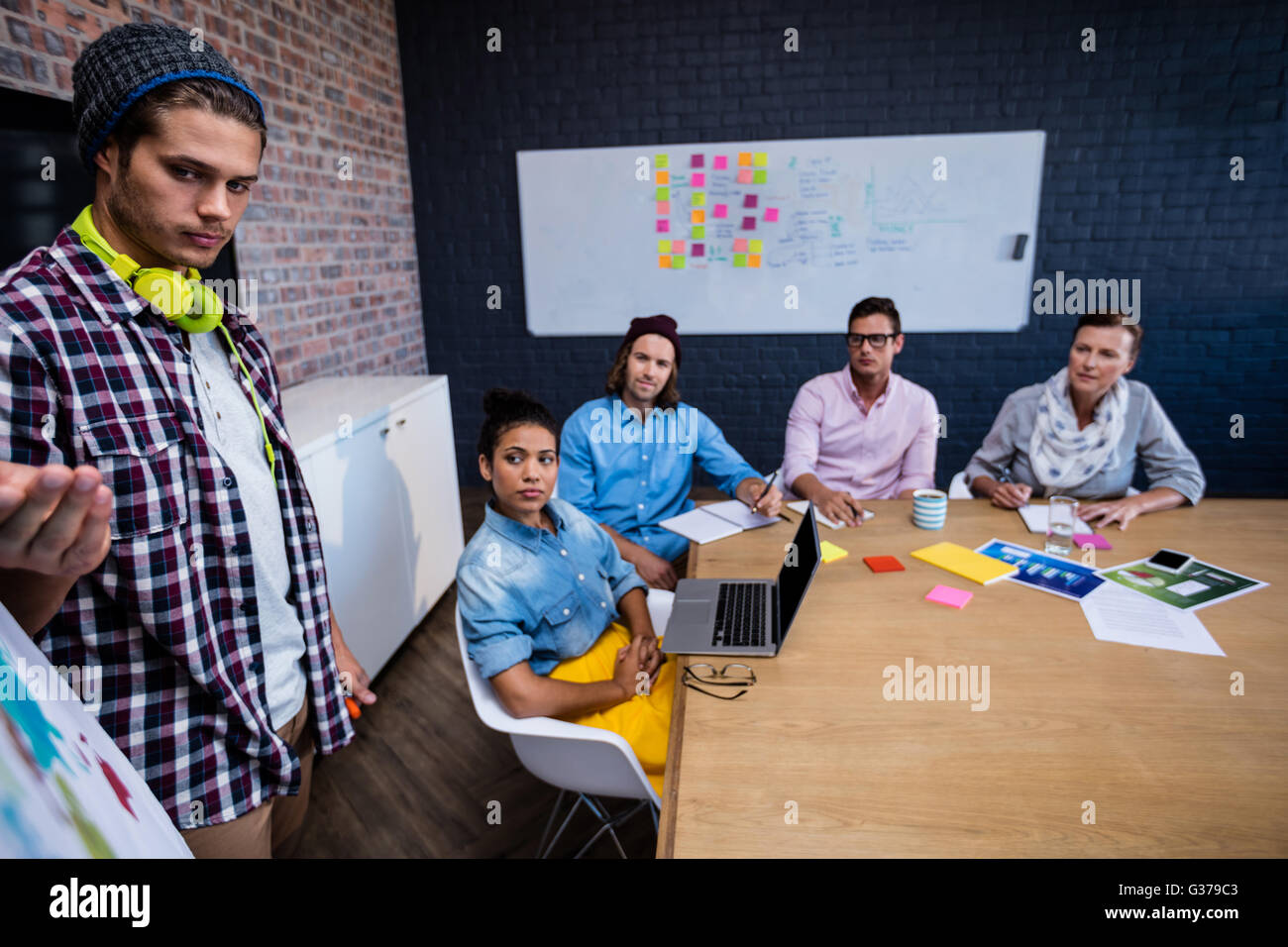 Group of designers working on project Stock Photo - Alamy