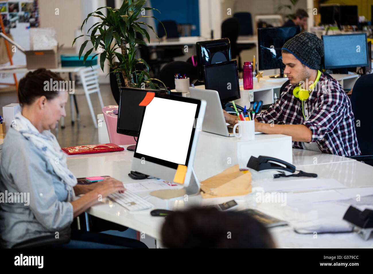 Female typing staff hi-res stock photography and images - Alamy