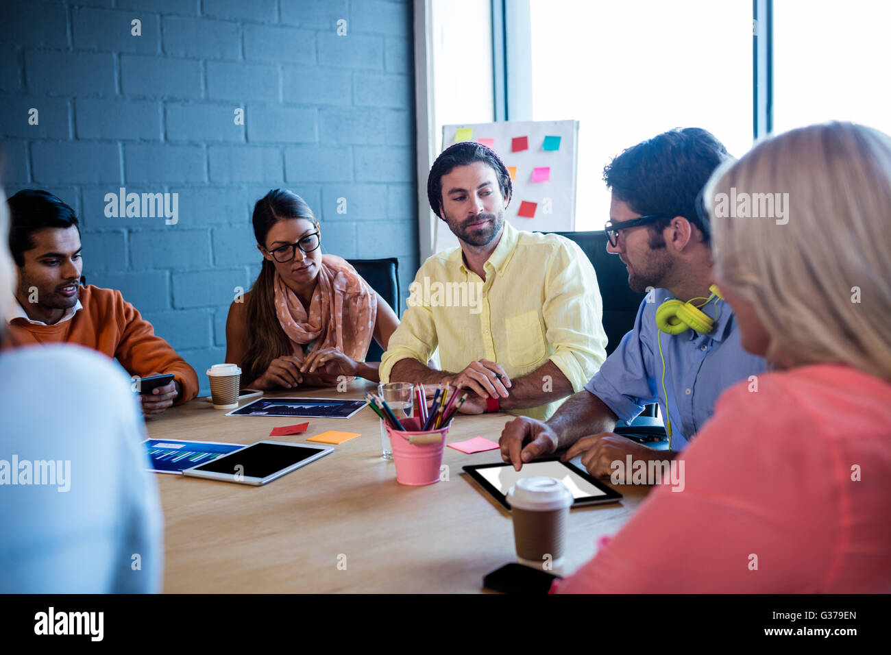 Group of people working on a project hi-res stock photography and ...