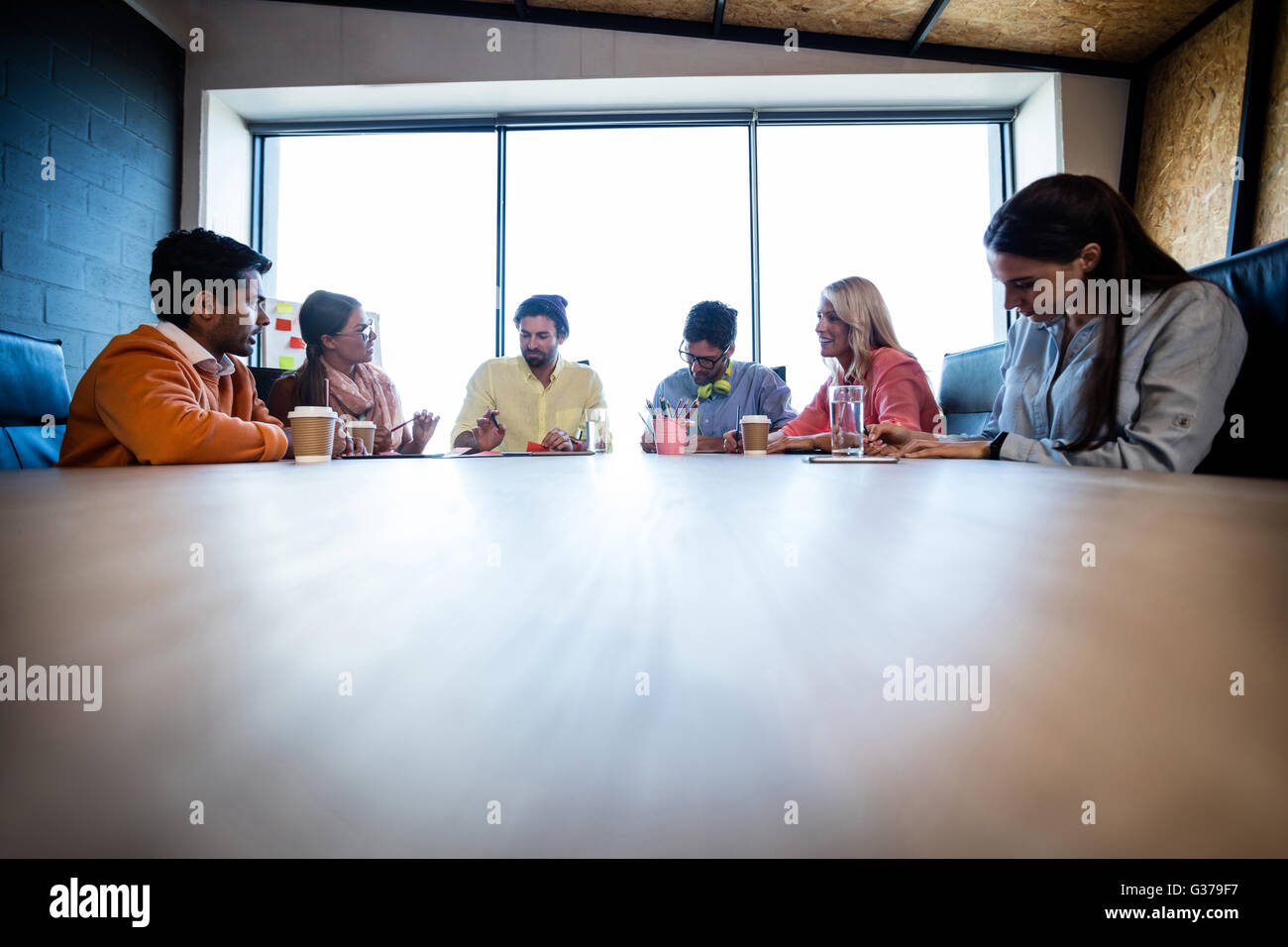 Designers meeting together Stock Photo - Alamy