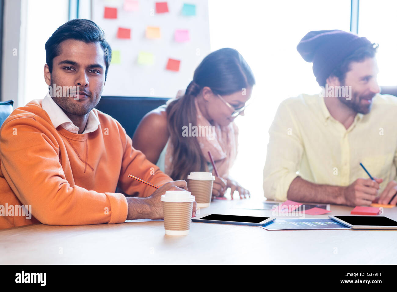 Group of smiling coworkers Stock Photo - Alamy