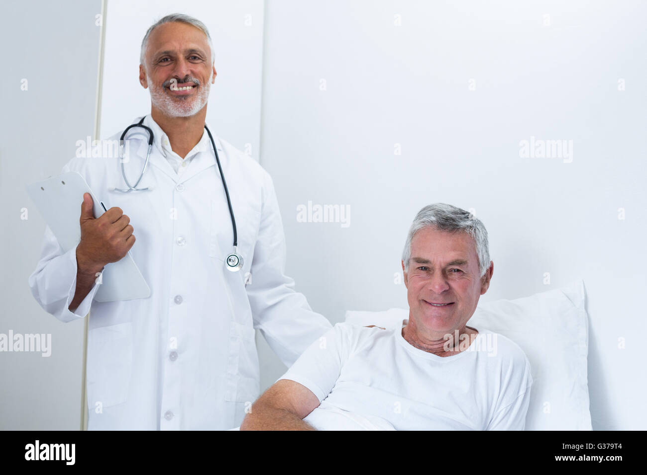 Happy doctor portrait man hi-res stock photography and images - Alamy