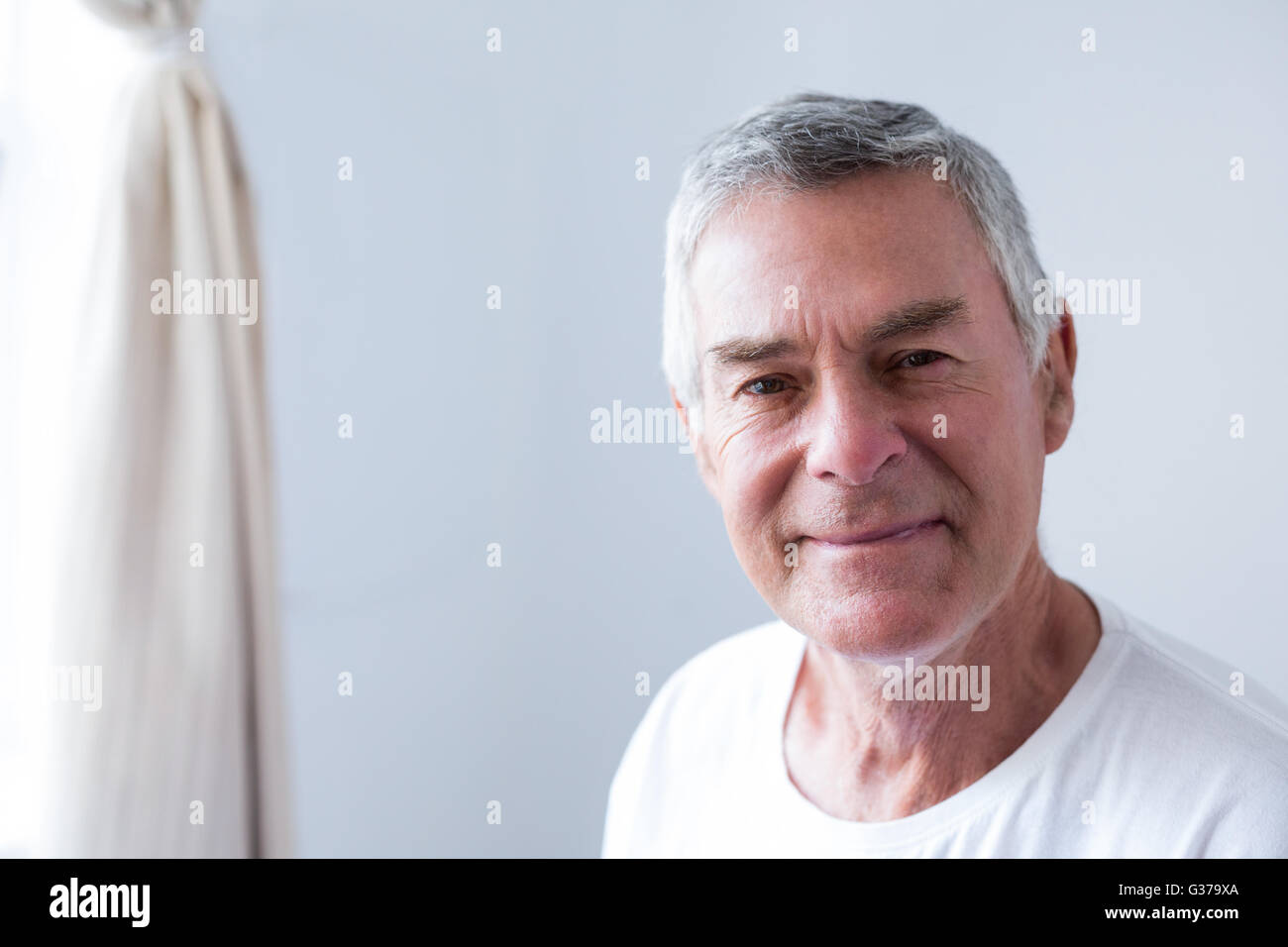 Portrait of senior man smiling Stock Photo - Alamy