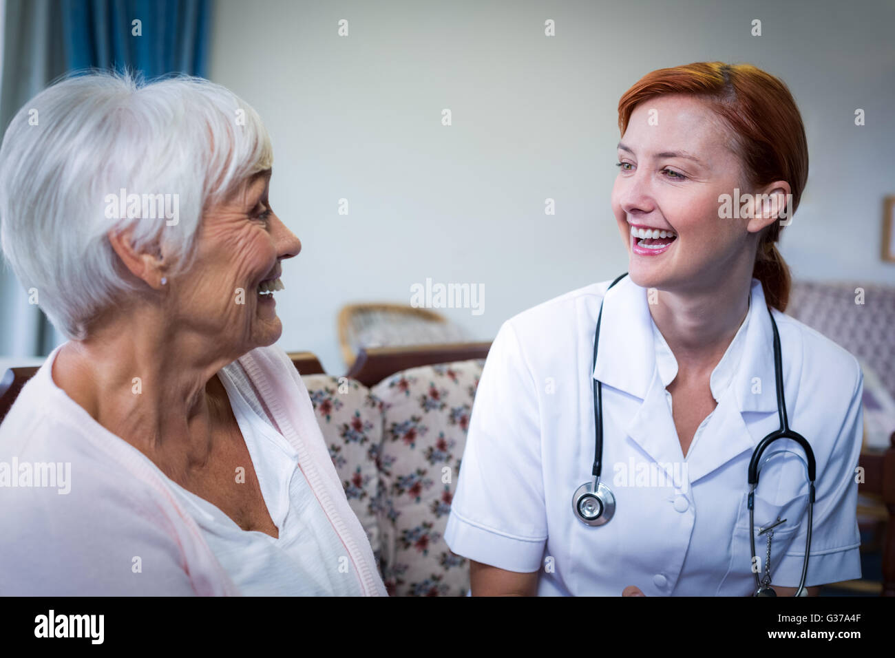 Happy doctor and patient Stock Photo - Alamy
