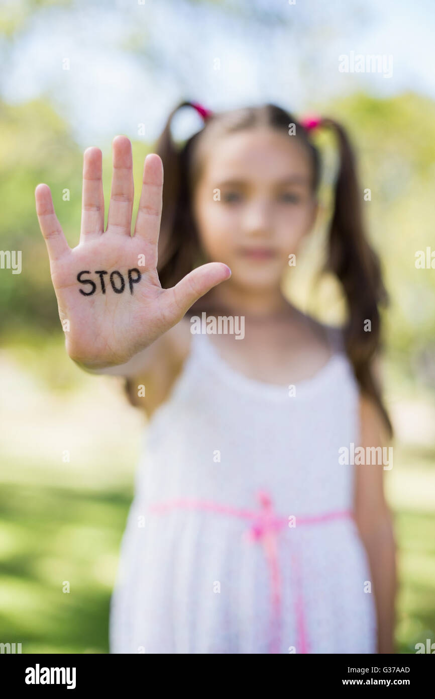 Girl making stop sign with her hand Stock Photo - Alamy