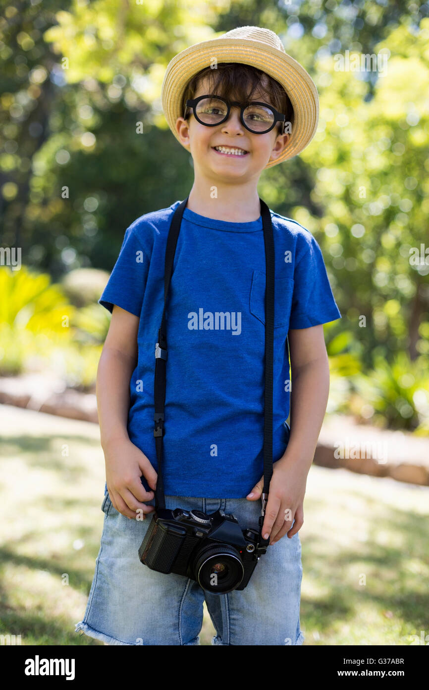 Boy posing with camera hi-res stock photography and images - Alamy