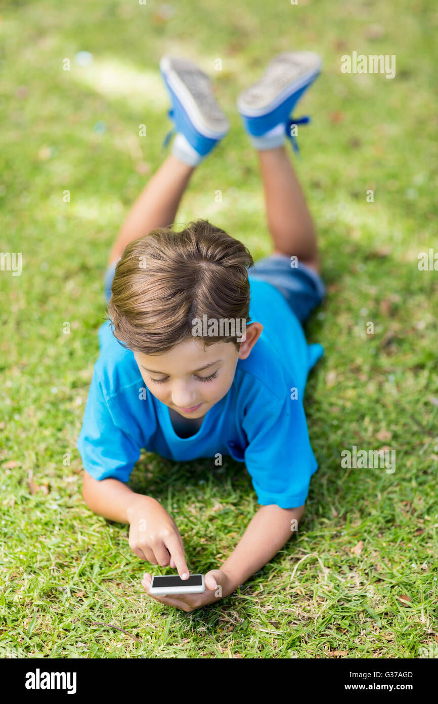 Young boy using mobile phone Stock Photo - Alamy