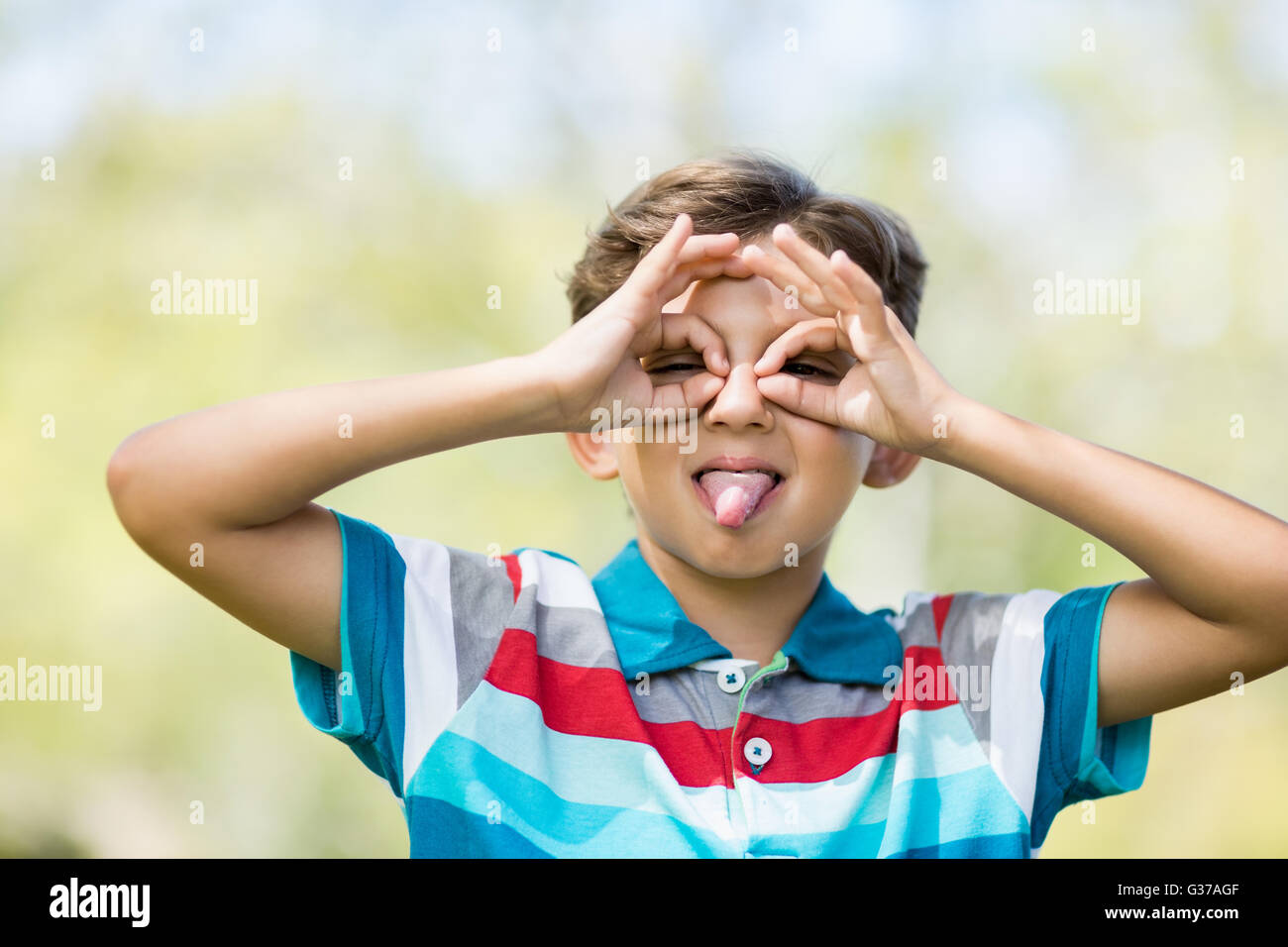 Young boy making a funny faces Stock Photo - Alamy