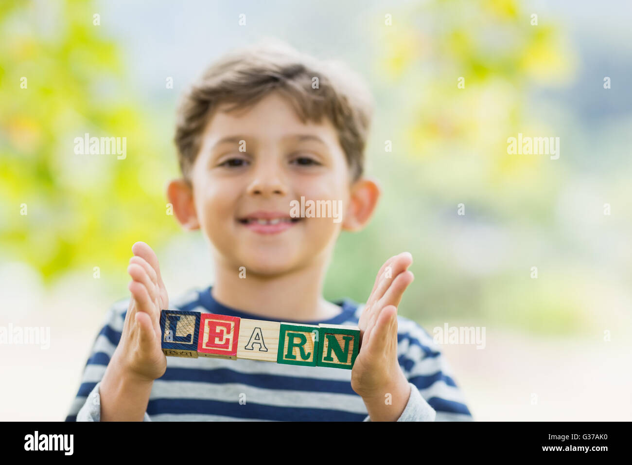 Boy playing blocks hi-res stock photography and images - Alamy