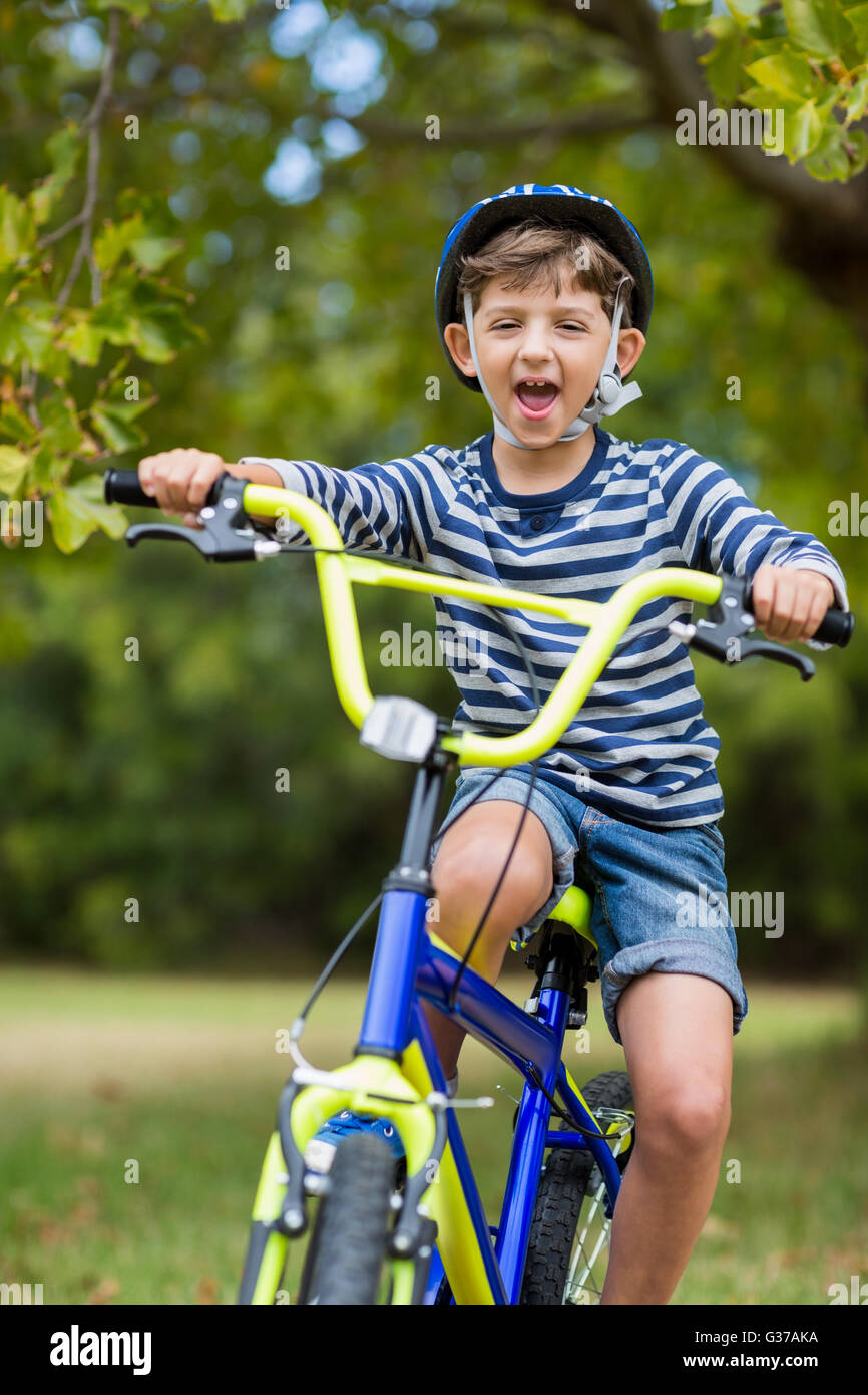 Boy riding his bicycle hi-res stock photography and images - Alamy