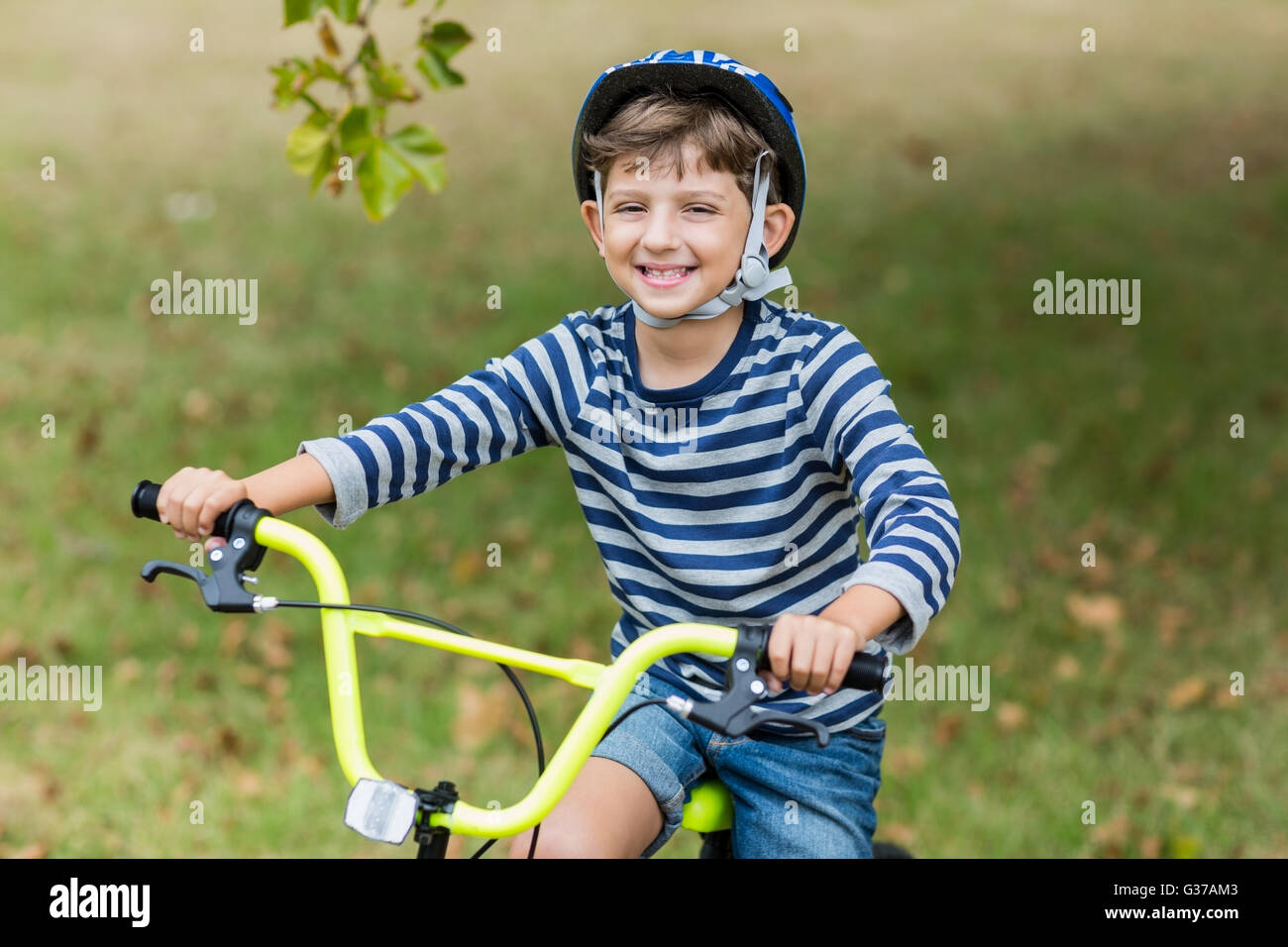 Boy riding his bicycle hi-res stock photography and images - Alamy