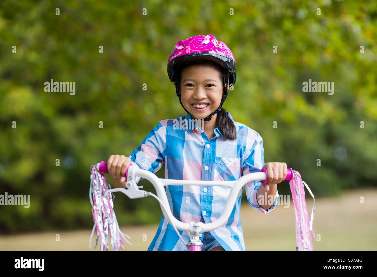 Pretty girl girl with bicycle hi-res stock photography and images - Alamy