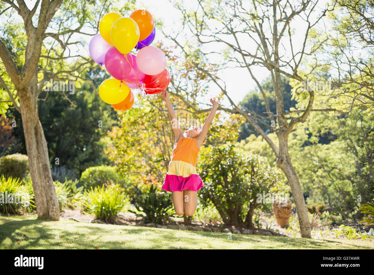 Child playing with balloons hi-res stock photography and images - Alamy