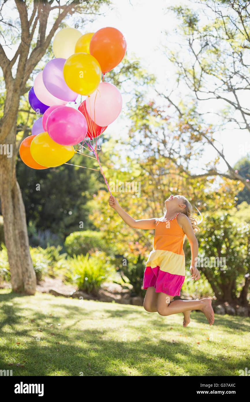 Child playing with balloons hi-res stock photography and images - Alamy
