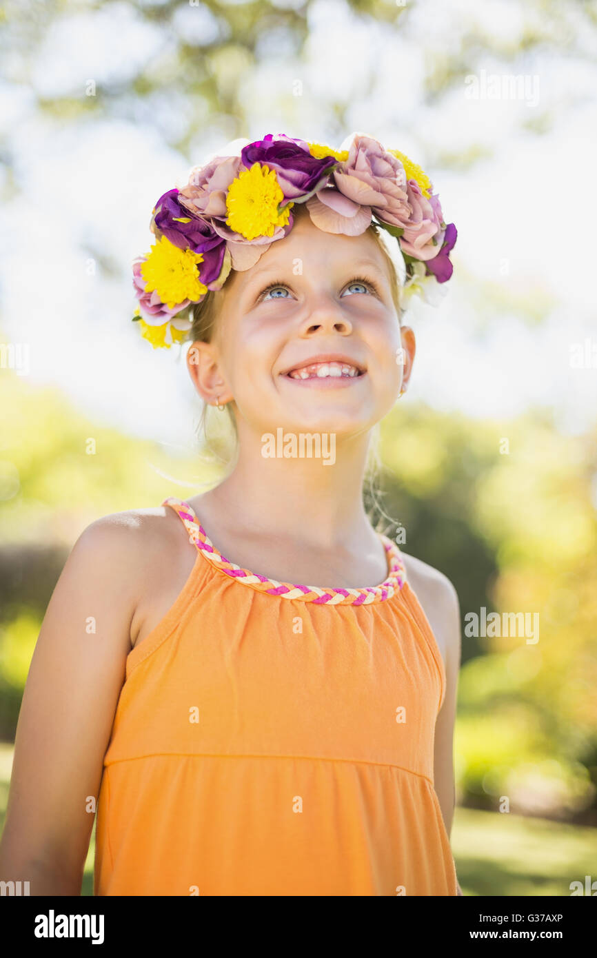 Thoughtful girl smiling in park Stock Photo - Alamy