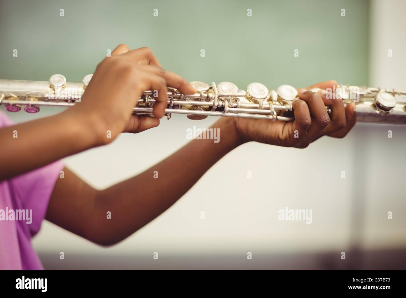 Student playing flute hi-res stock photography and images - Alamy