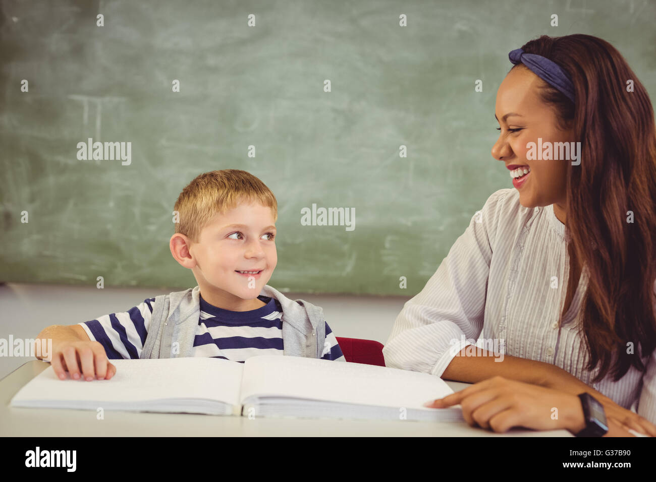 Talking classroom teacher hi-res stock photography and images - Alamy