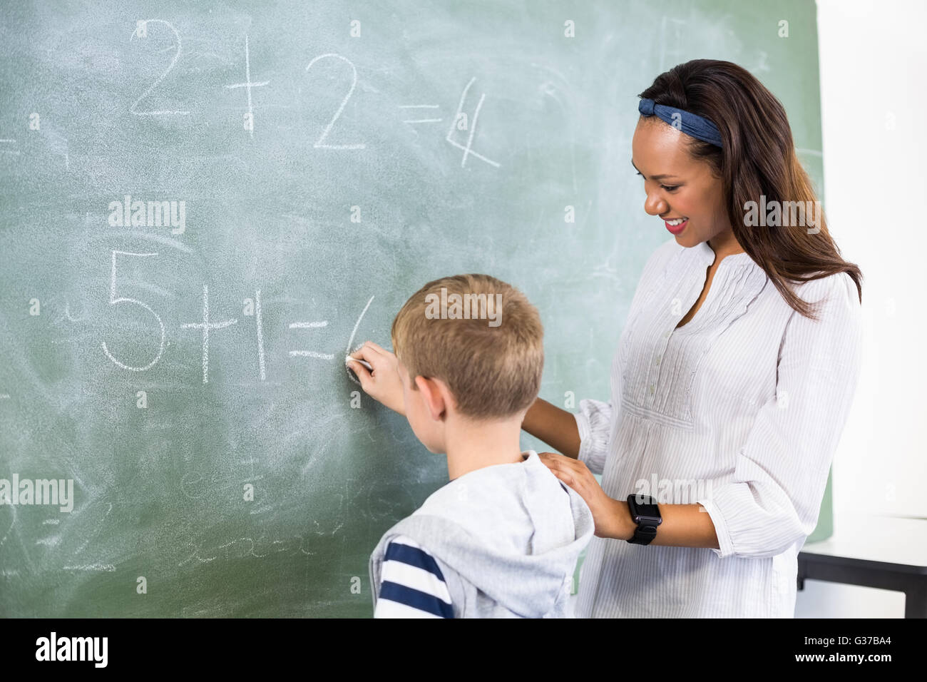 Boy solving sums hi-res stock photography and images - Alamy