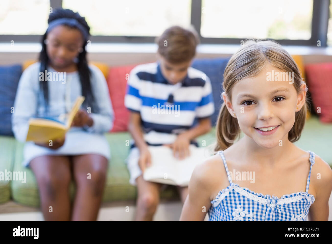 Portrait smiling happy schoolgirl hi-res stock photography and images ...