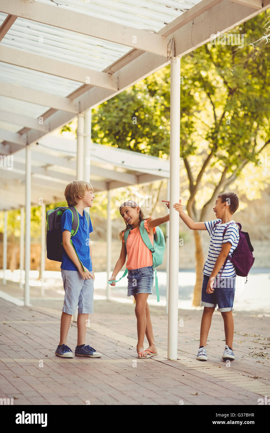 Two Kids Talking At School