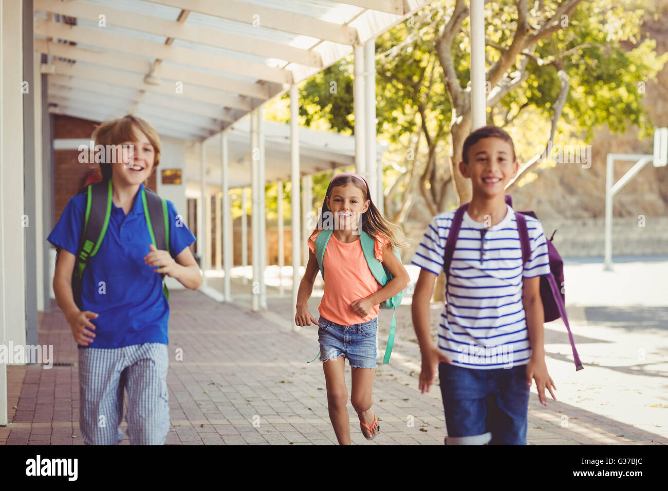 Back of kids running hi-res stock photography and images - Alamy