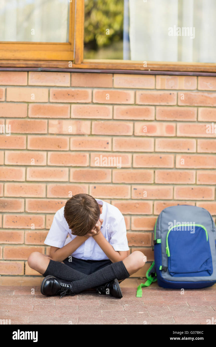 Boy sad school uniform hi-res stock photography and images - Alamy
