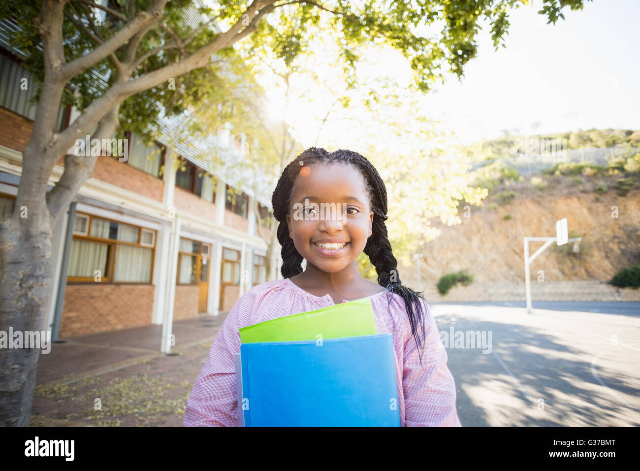 Happy schoolgirl hi-res stock photography and images - Alamy
