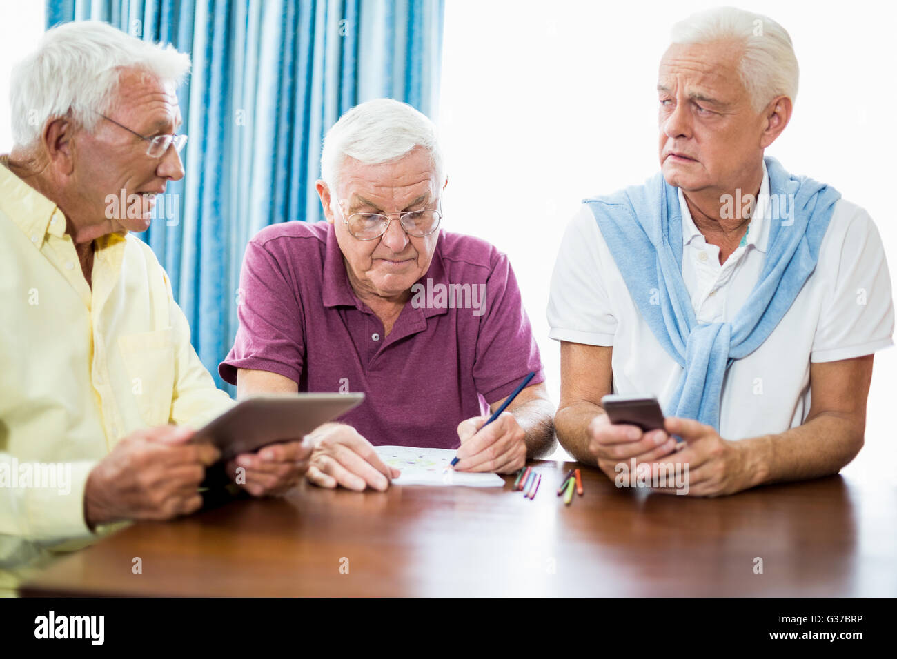 Senior men together hi-res stock photography and images - Alamy