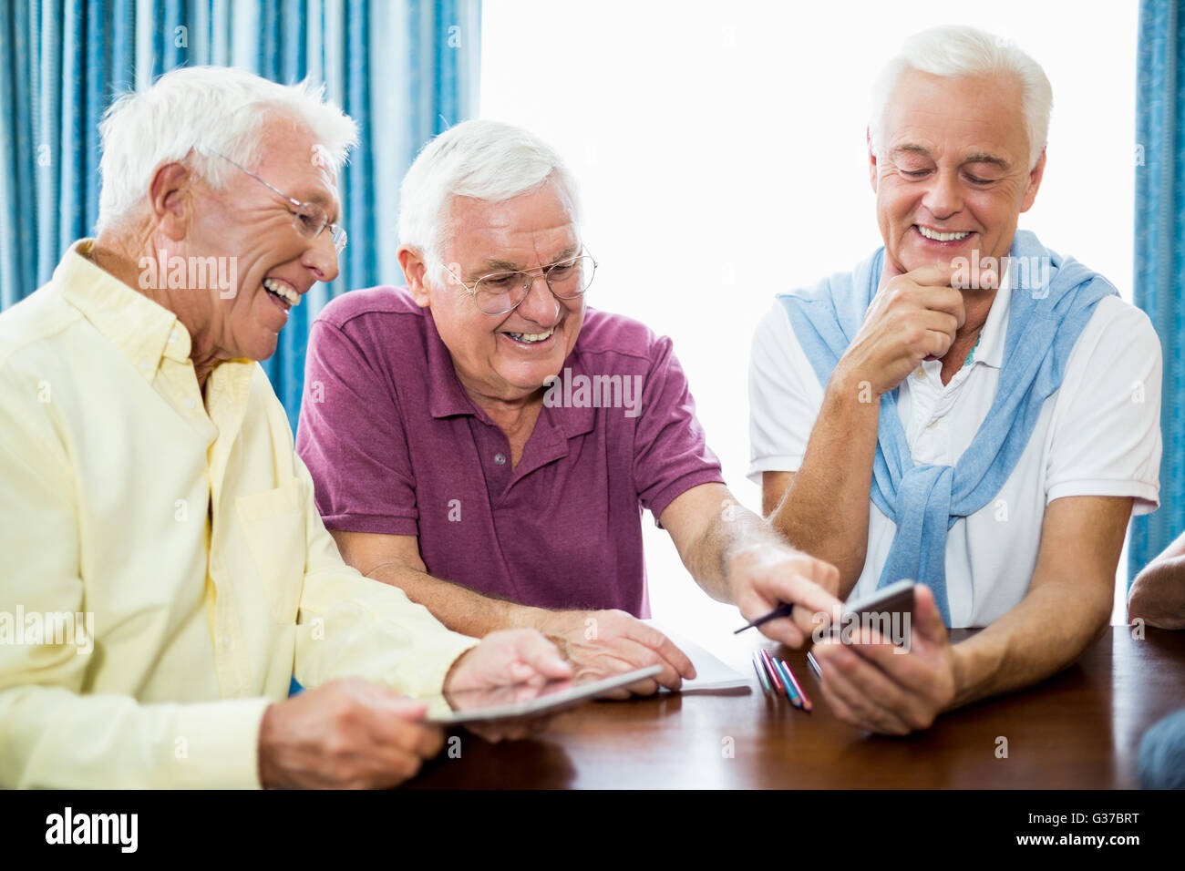 Senior men spending time together Stock Photo - Alamy
