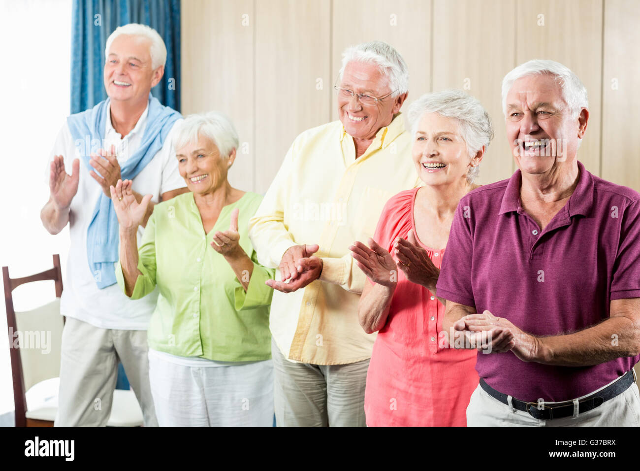Seniors clapping hands Stock Photo - Alamy