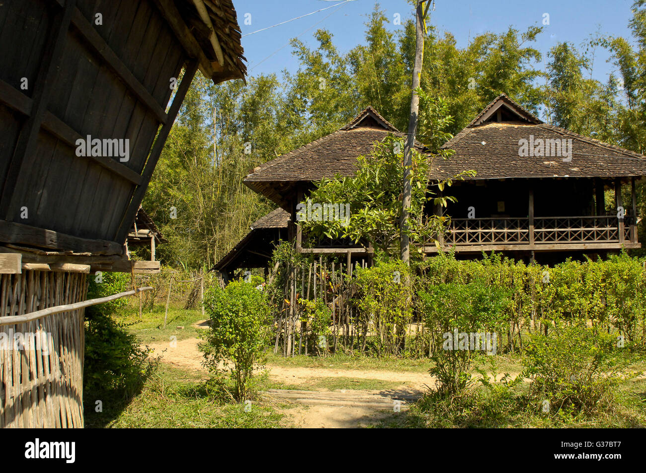 Houses in a typical AKHA village near KENGTUNG also known as KYAINGTONG ...