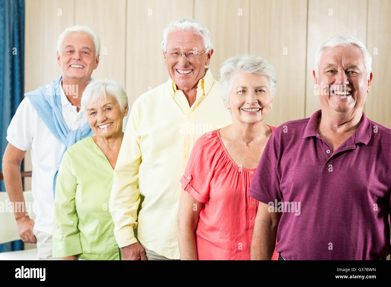 Seniors standing together Stock Photo - Alamy