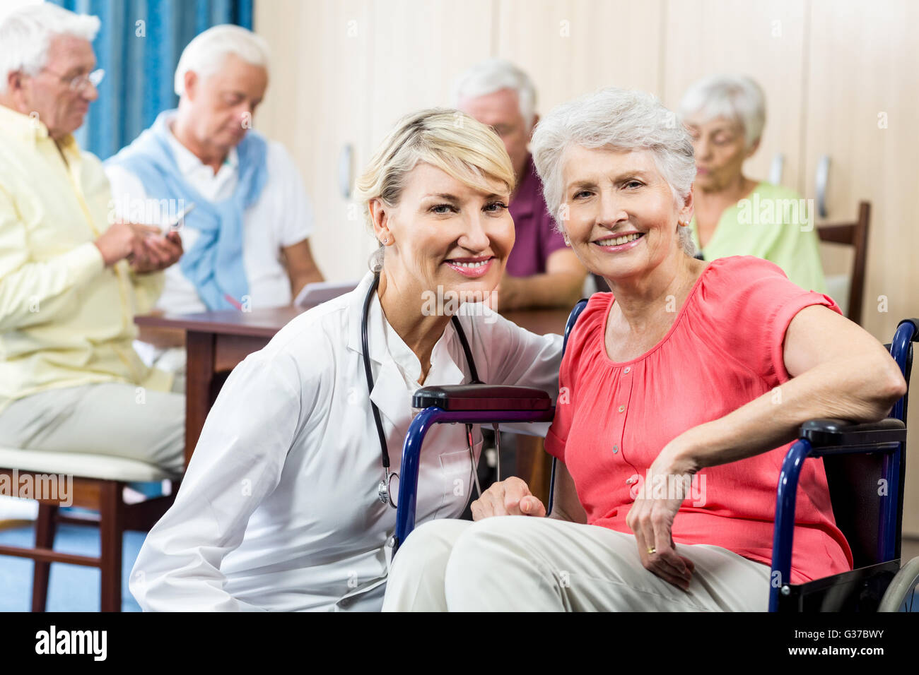 Mature woman in wheelchair in hi-res stock photography and images - Alamy