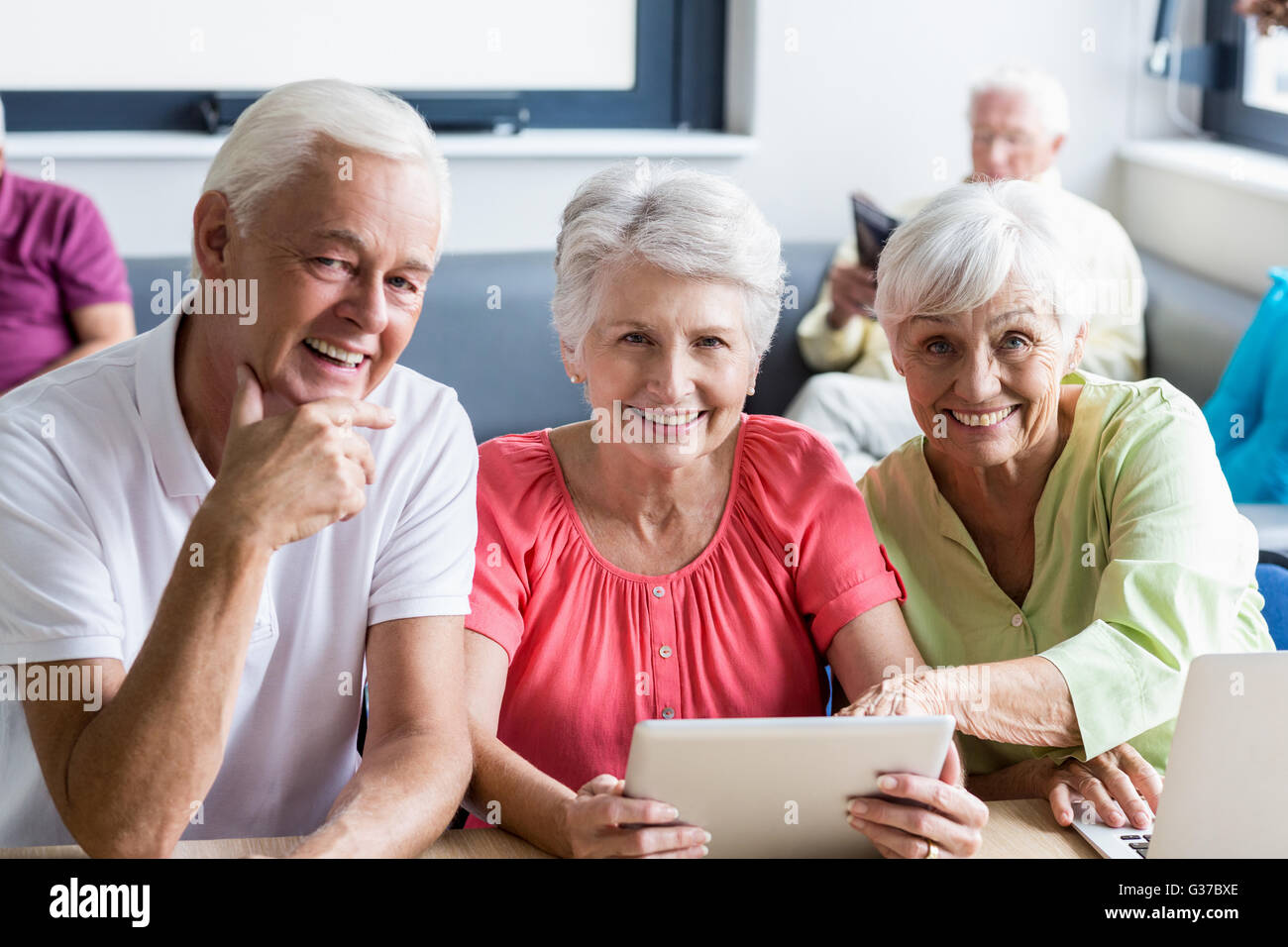 Seniors using technology Stock Photo - Alamy