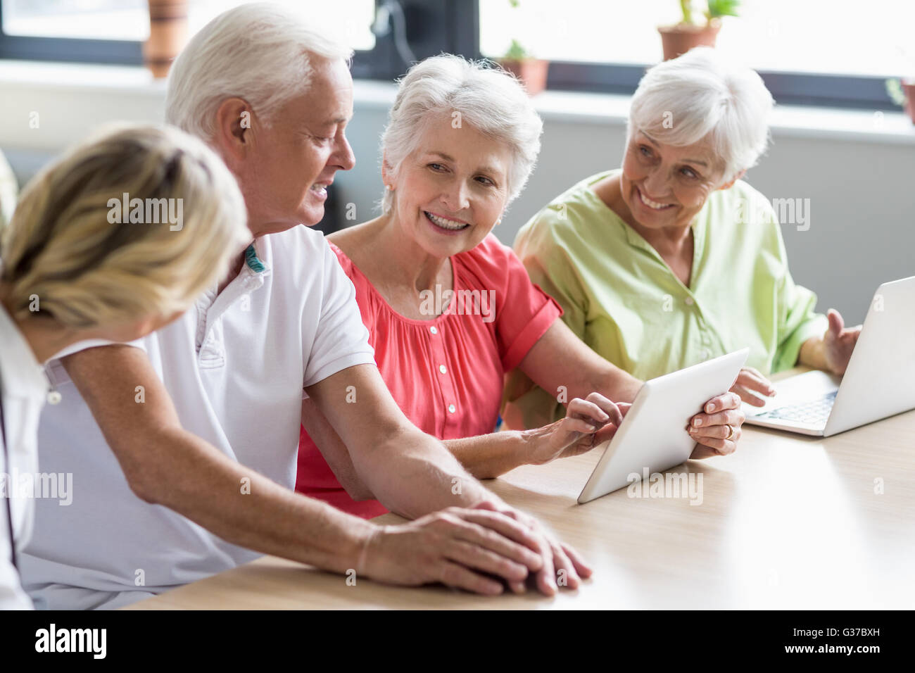 Seniors using technology Stock Photo - Alamy