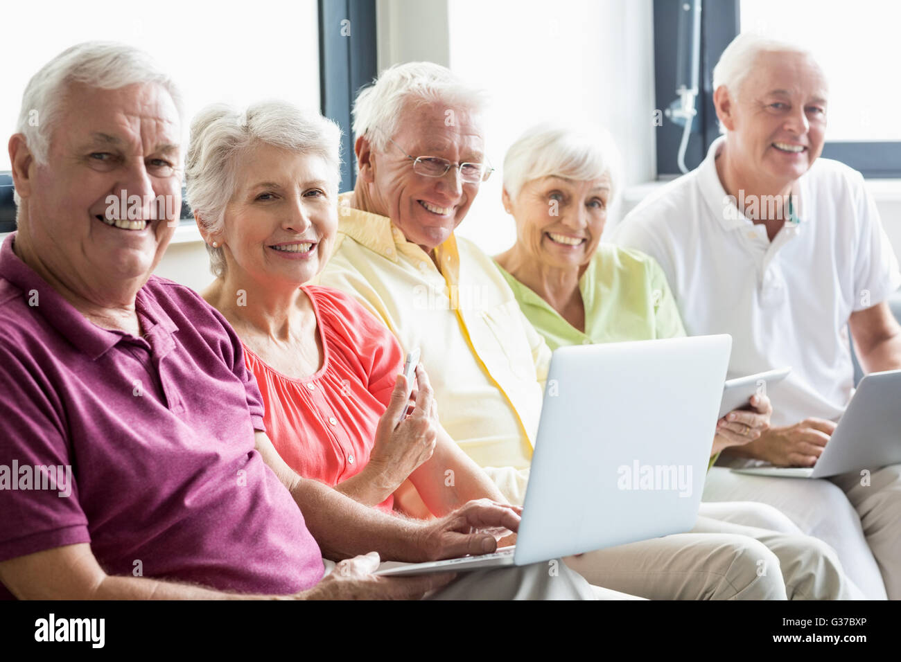 Seniors using technology Stock Photo - Alamy