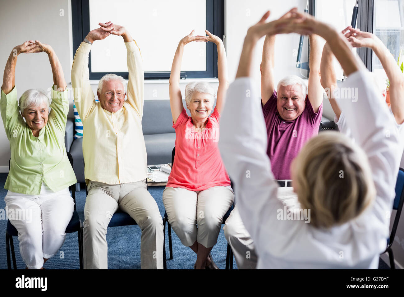 Seniors doing exercises Stock Photo - Alamy