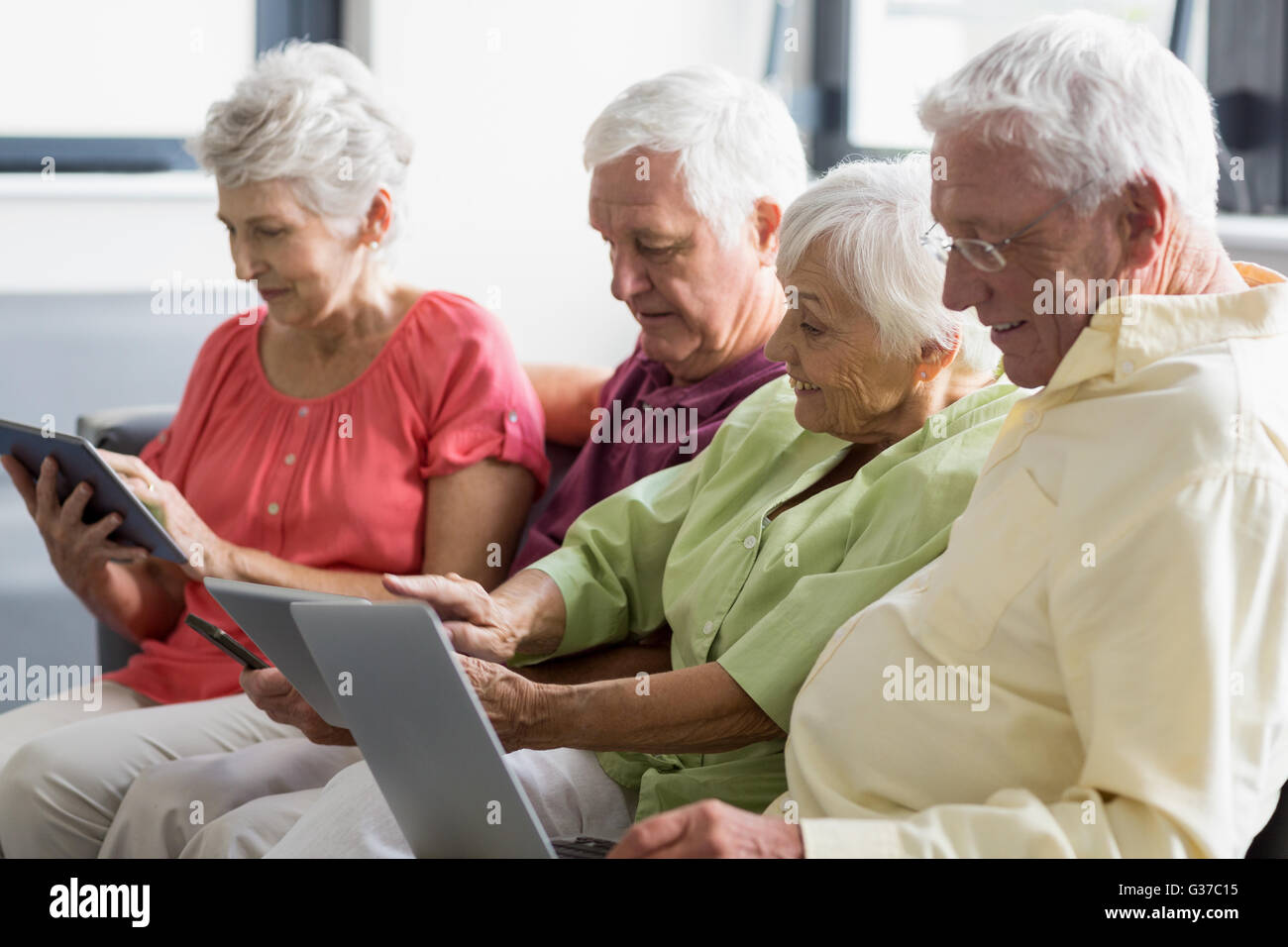 Using tablets hi-res stock photography and images - Alamy