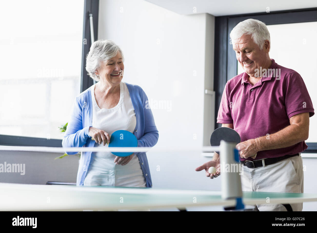 Elderly woman playing ping pong hi-res stock photography and images - Alamy